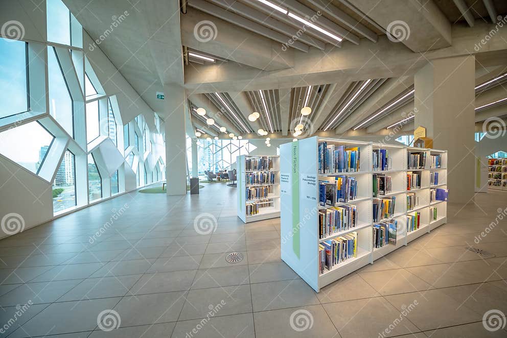 A Modern and Spacious Bookshelves at the Calgary Library with Interior ...