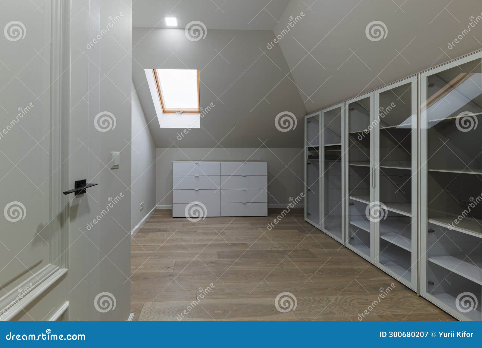 Glass Elegance: Large White Wardrobe in Modern Closet Design Stock ...