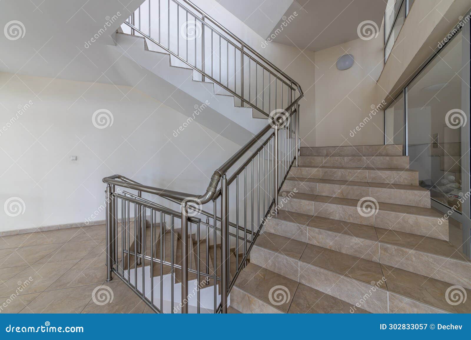 Modern Stair Case between Floors. Stairs with Metallic Rail in Modern ...