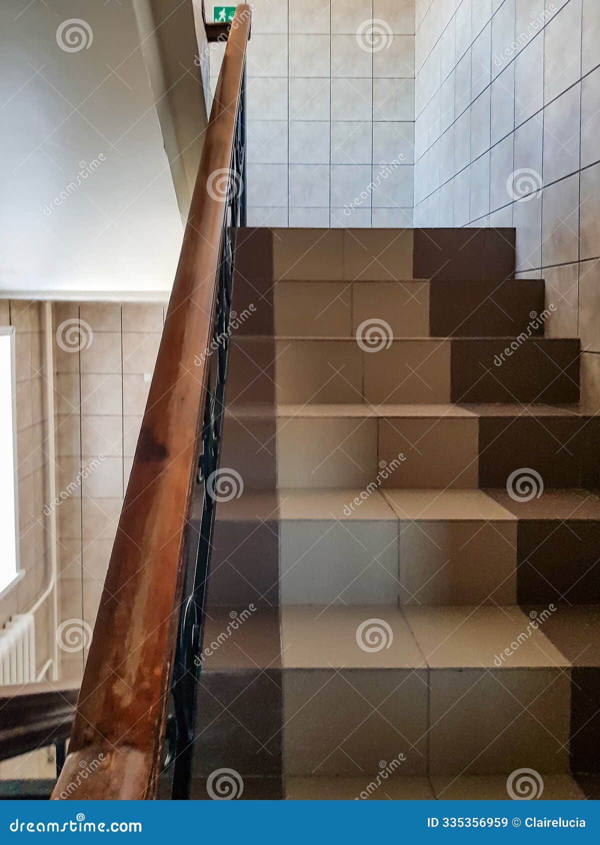 Modern Staircase with Ceramic Tile Steps and Wooden Handrails, Vertical ...
