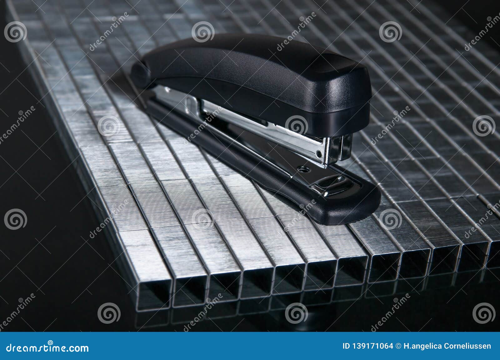 A Stapler And The Documents Files In Office On The Table, Staple The ...