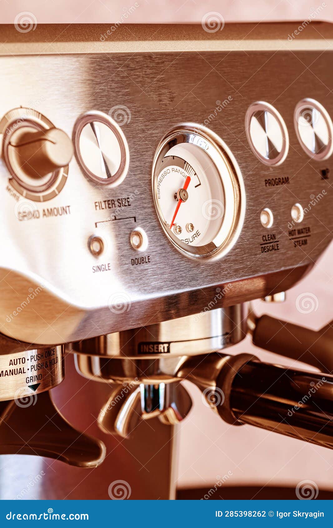 Modern Steel Coffee Machine with Control Buttons and a Barometer. Close ...
