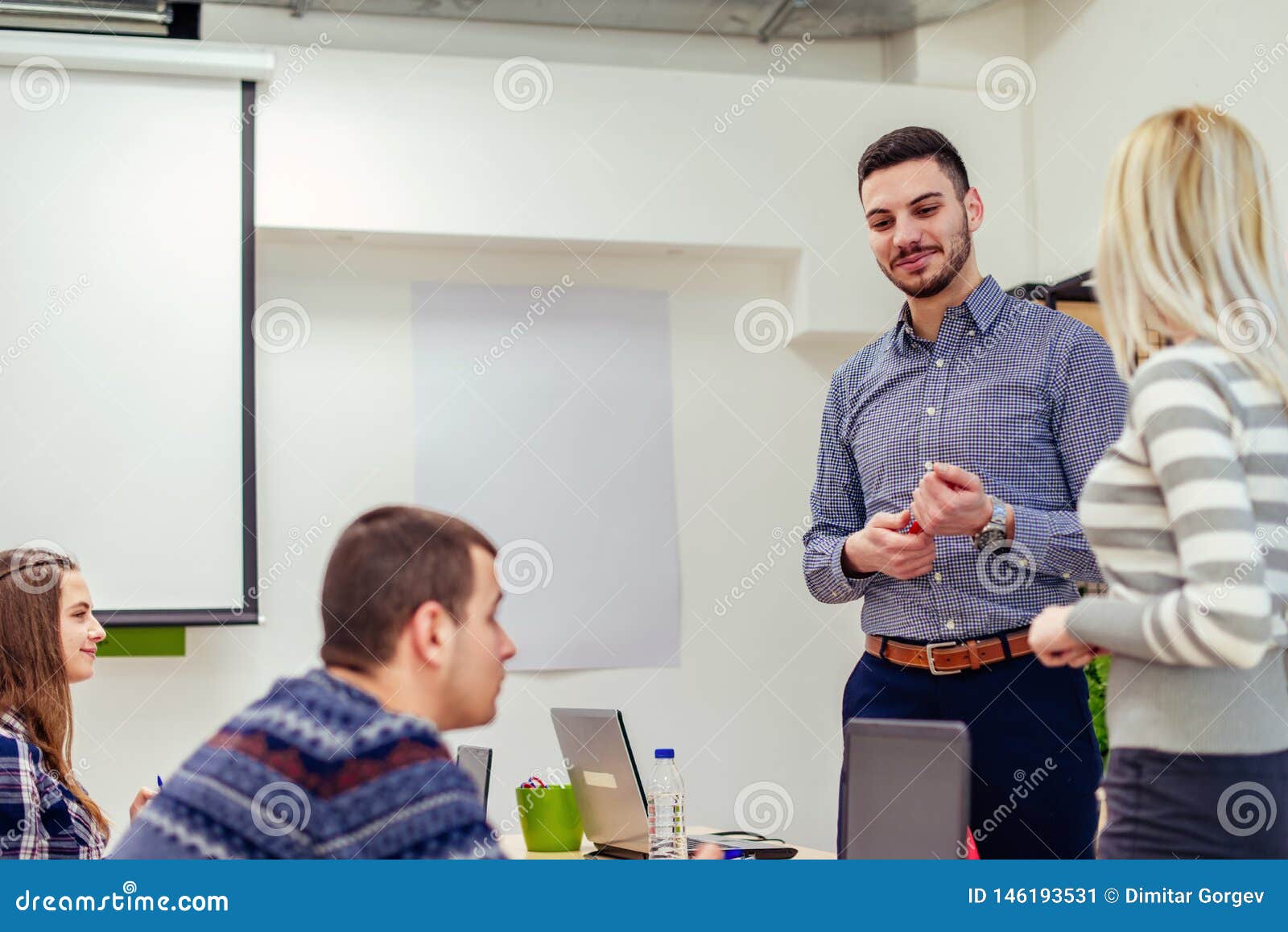 Students Looking in Their Teacher Stock Image - Image of indoors ...