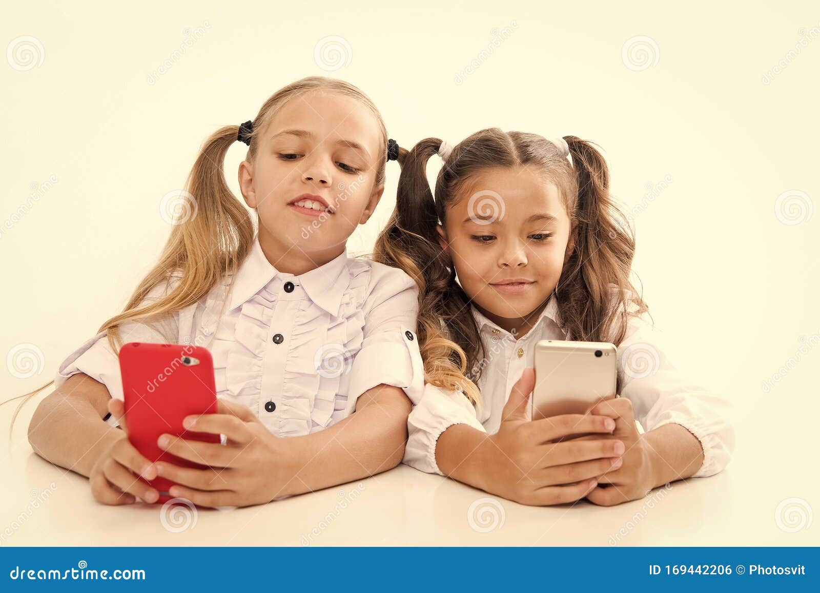 Modern Students. Small Students Using Mobile Phones in Classroom ...