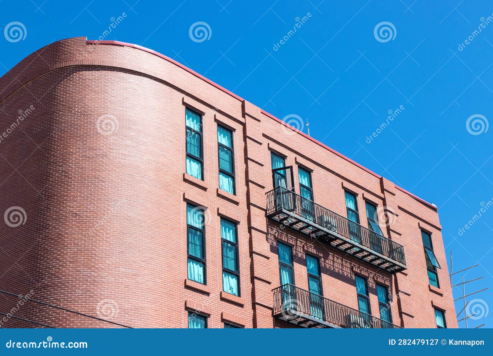 Modern Style Brown Brick Building on Dark Sky Background Stock Image ...