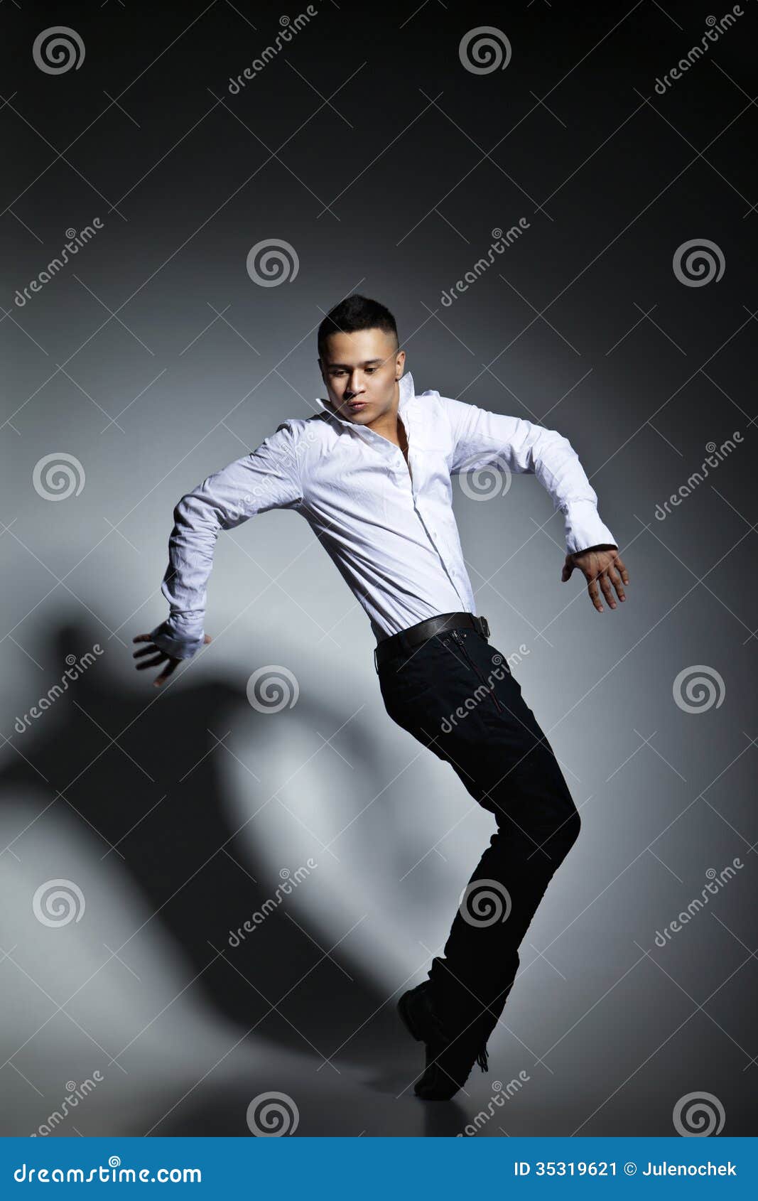 Modern Style Dancer Posing on Grey Background Stock Image - Image of ...