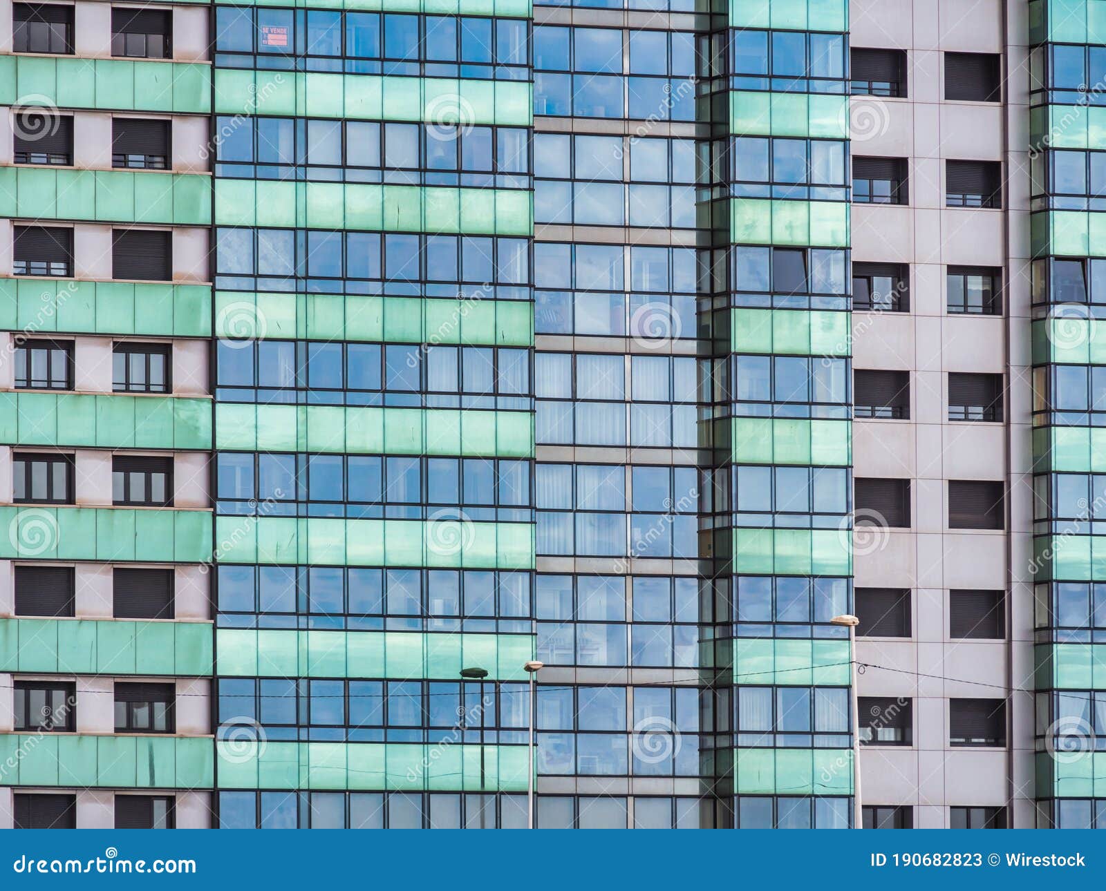 Modern Styled Skyscraper with Blue and Green Windows Stock Image ...