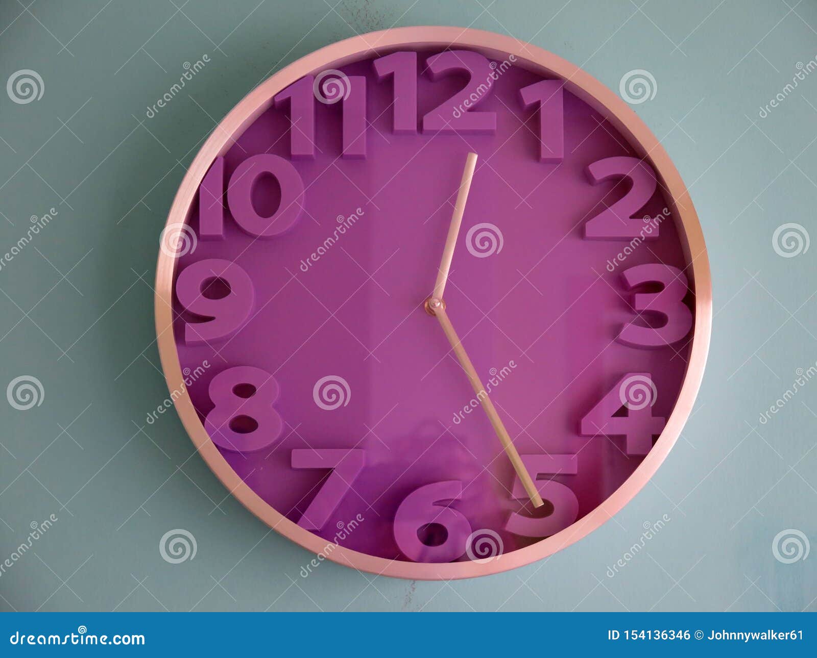Purple Wall Clock on Blue Background Stock Photo - Image of purple ...
