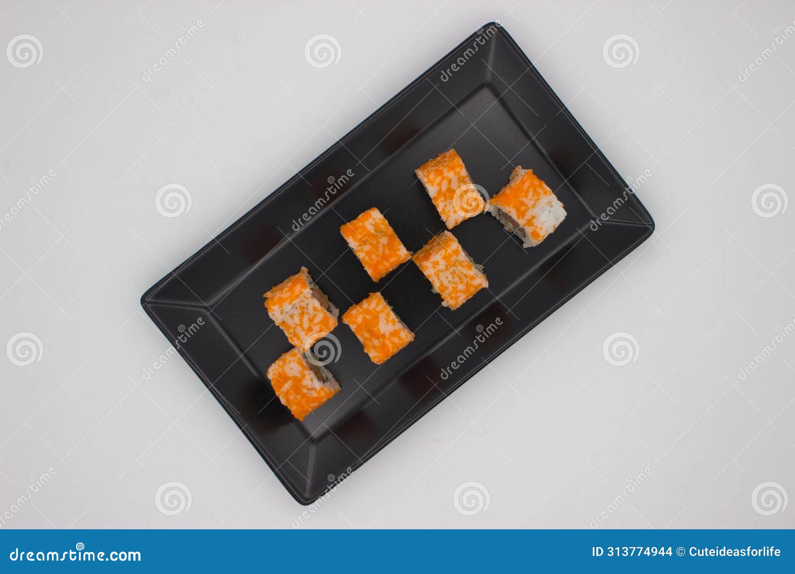 Modern Sushi Presentation on a Black Rectangular Plate Stock Photo ...