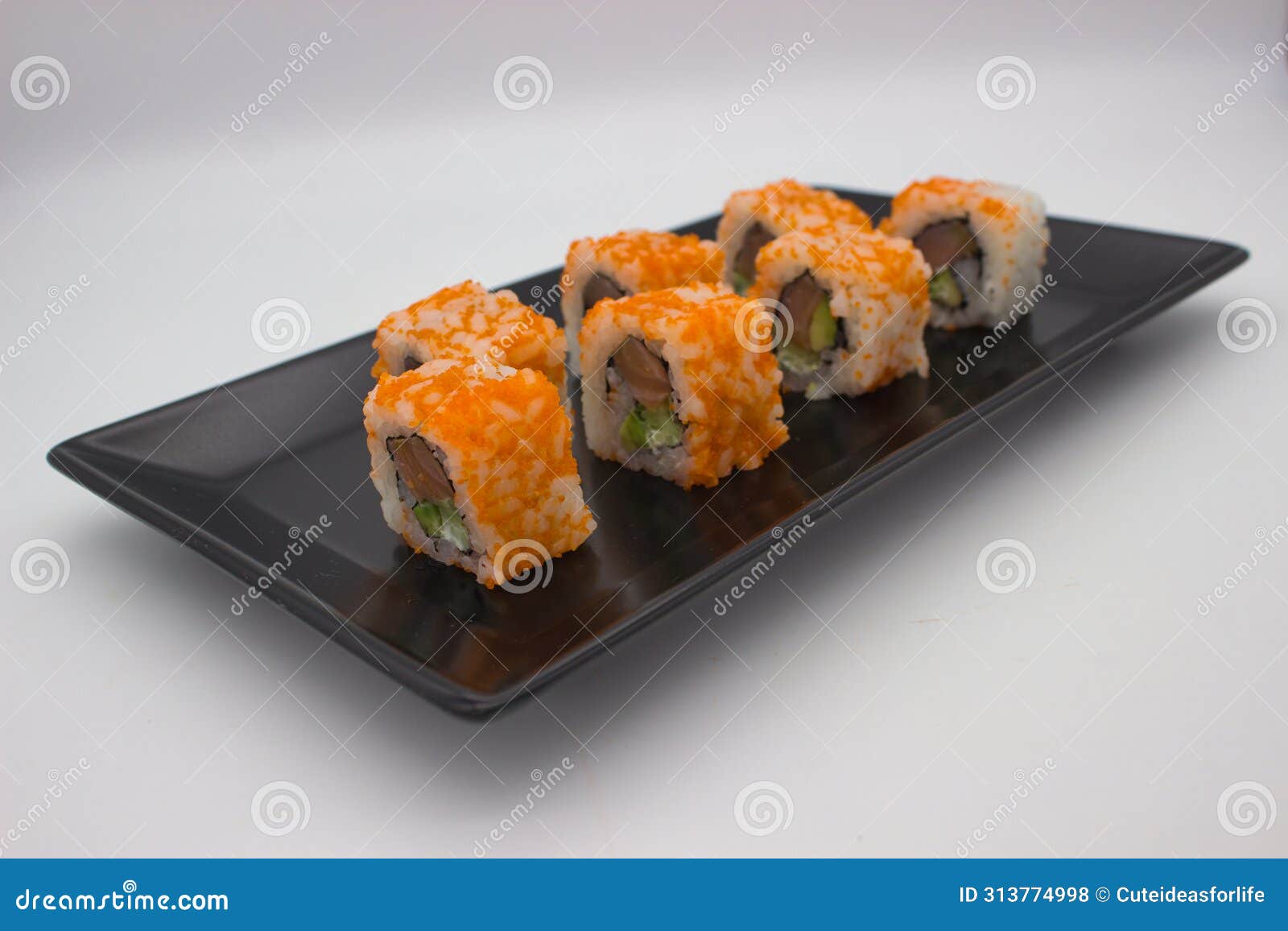 Modern Sushi Presentation on a Black Rectangular Plate Stock Photo ...