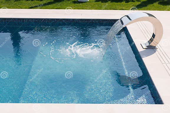 Modern Swimming Pool with Curved Water Feature Stock Image - Image of ...