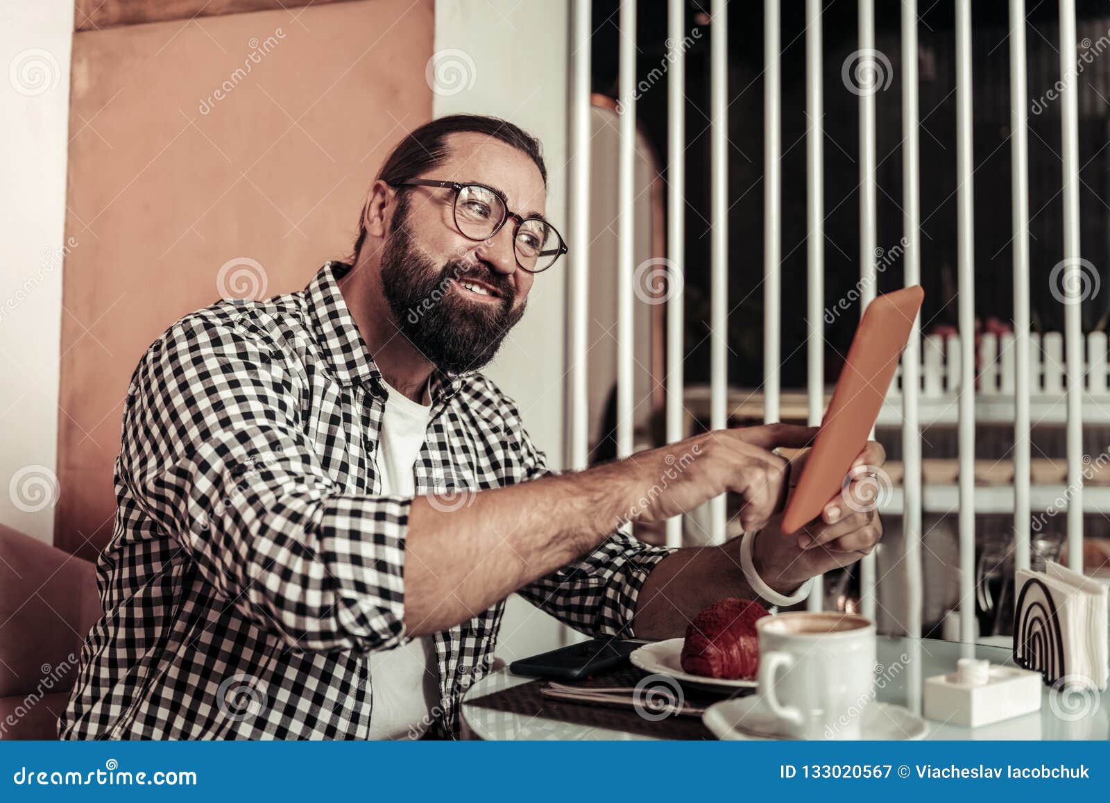 Positive Joyful Man Using His Digital Device Stock Image - Image of ...