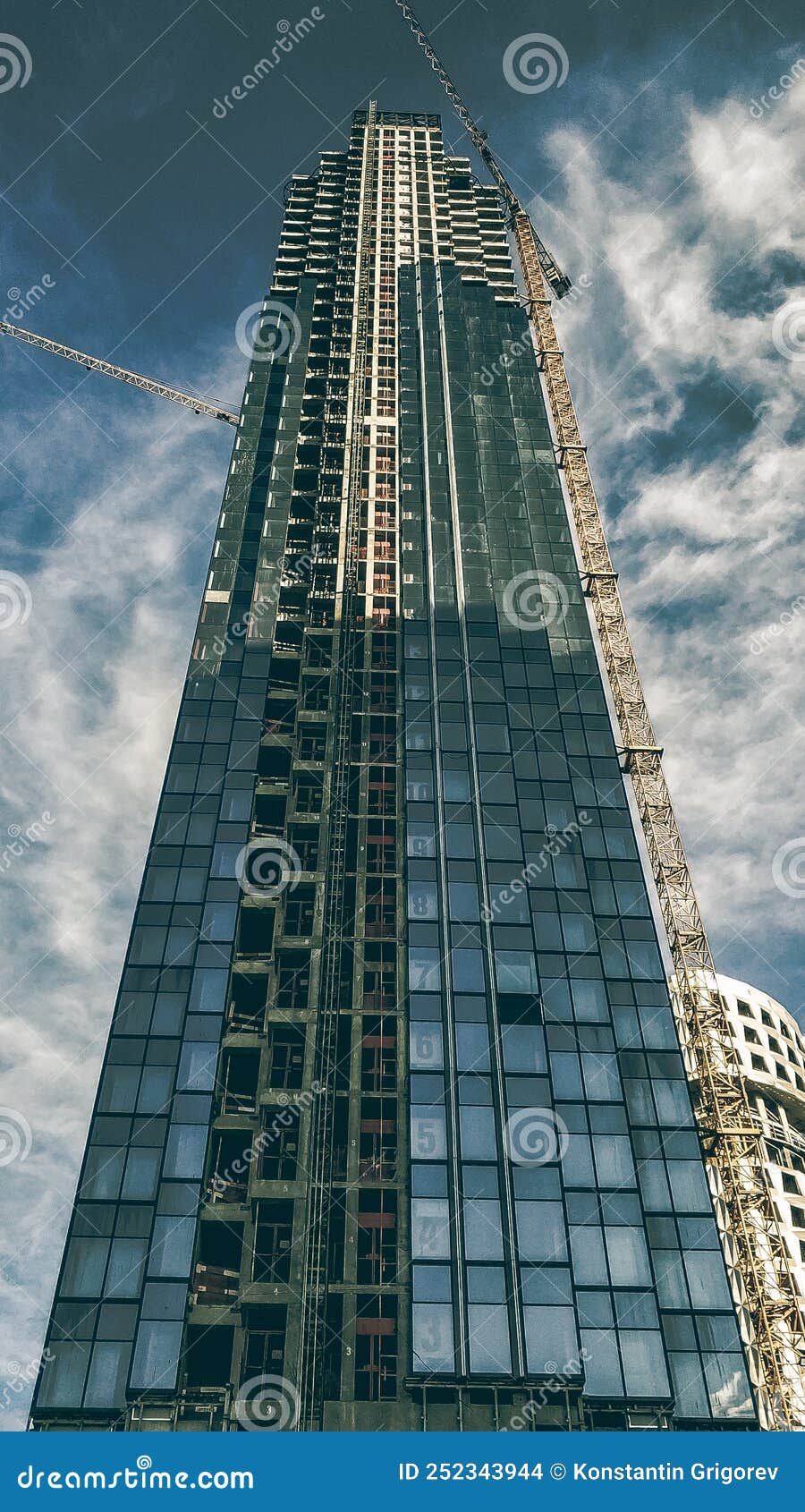 Modern Tall Glass Building Under Construction. Construction Site in ...