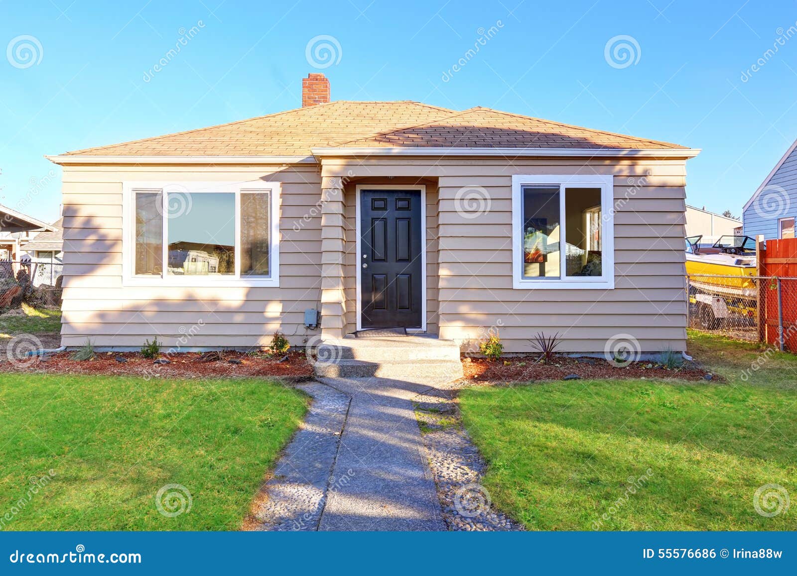 Modern Tan House with Walkway. Stock Photo - Image of design, modern ...