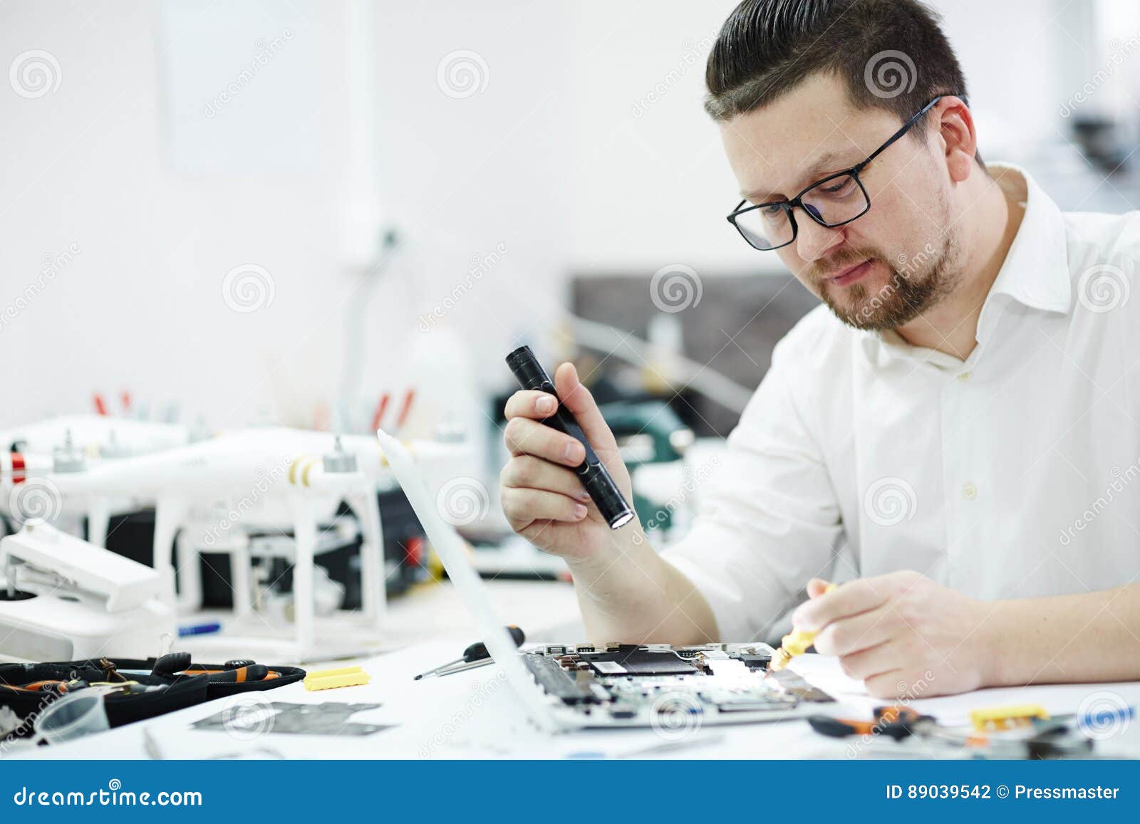 115 Inspecting Flashlight Stock Photos - Free & Royalty-Free Stock ...