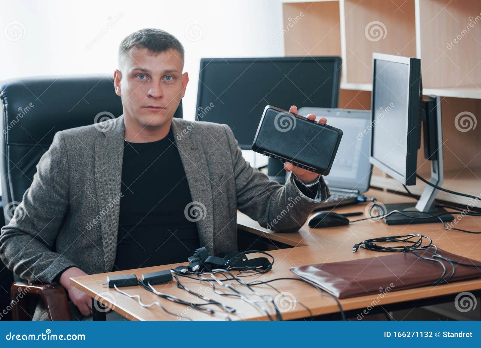 Modern Technologies. Polygraph Examiner Works in the Office with His ...