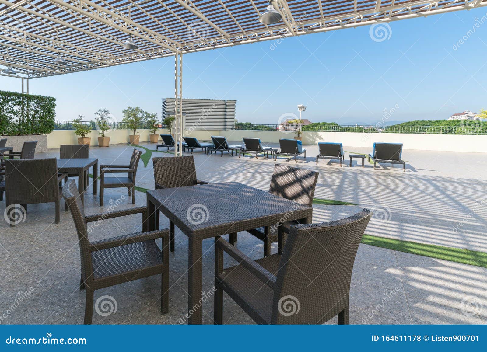 Modern Terrace with Chairs and Tables in a Sunny Day Stock Photo ...