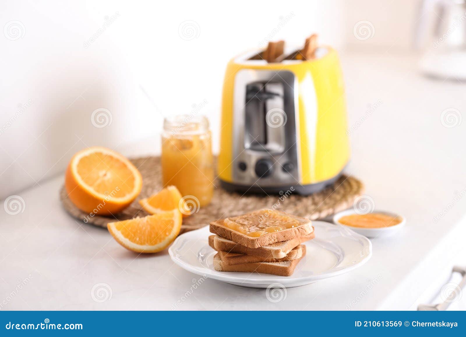 Modern Toaster and Delicious Breakfast on Table in Kitchen Stock Image ...