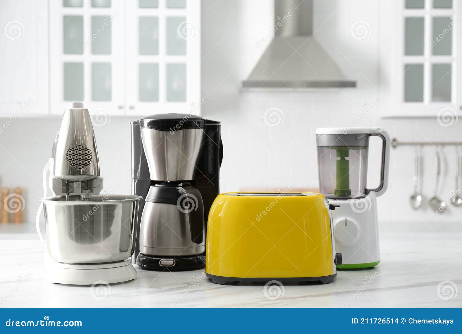 Modern Toaster and Other Home Appliances on White Marble Table in ...