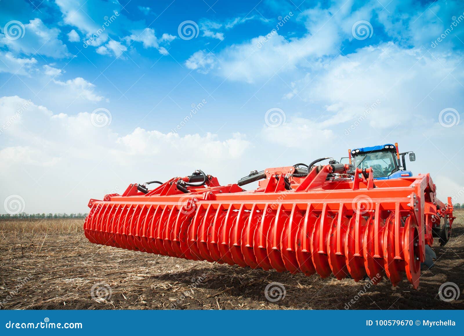 Modern Tractor in the Field with Complex for the Plowing of Soil. Stock ...