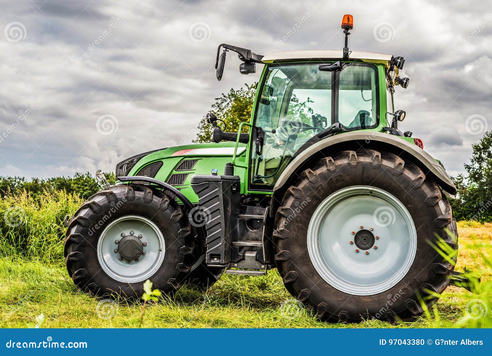 Tractor on field stock photo. Image of petrol, power - 97043380