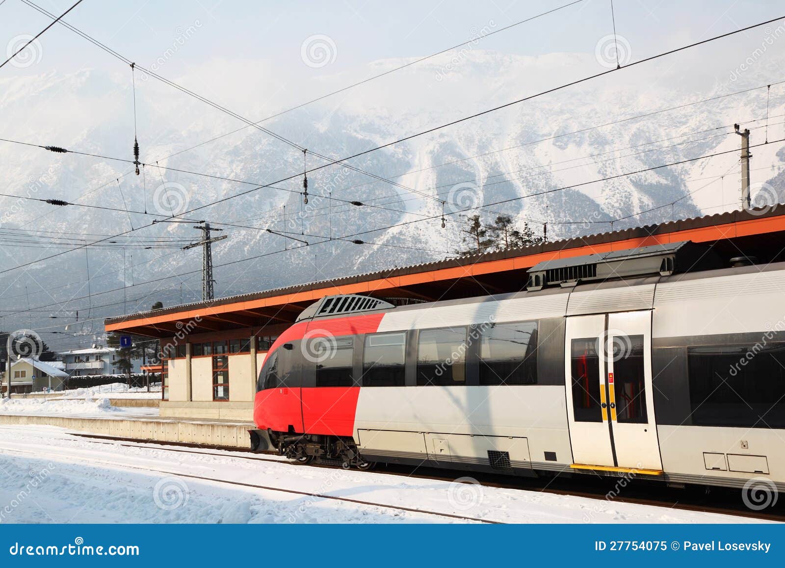 Modern Train Stops at Station Near Mountains Stock Image - Image of ...