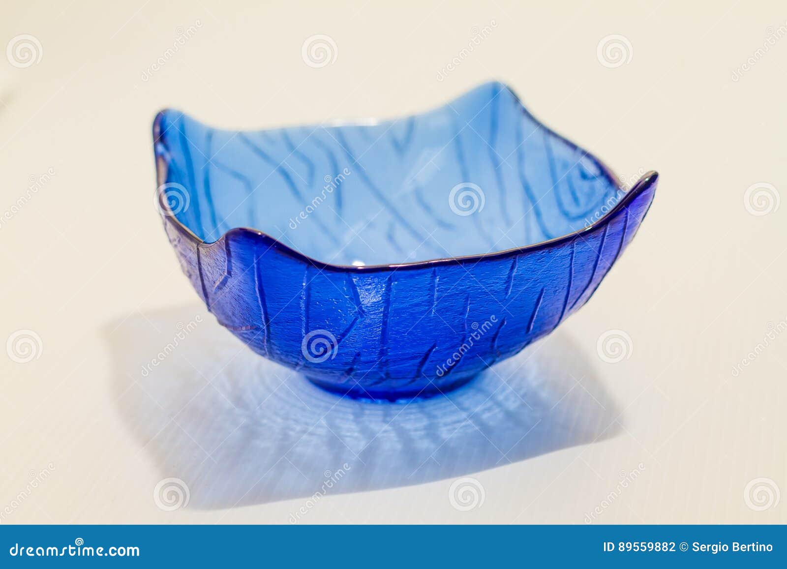 Modern Translucent Blue Glass Dish or Bowl Stock Photo - Image of ...