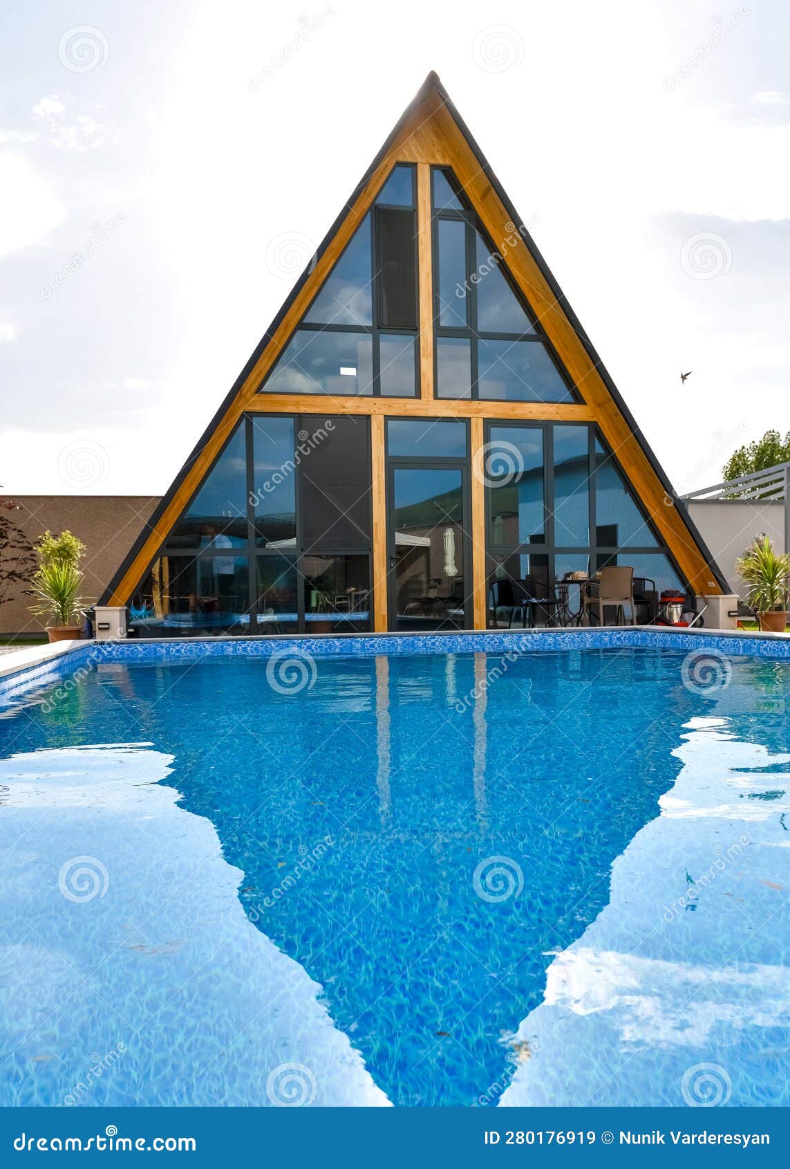 Modern Triangular Wooden Eco-house with a Pool Stock Image - Image of ...