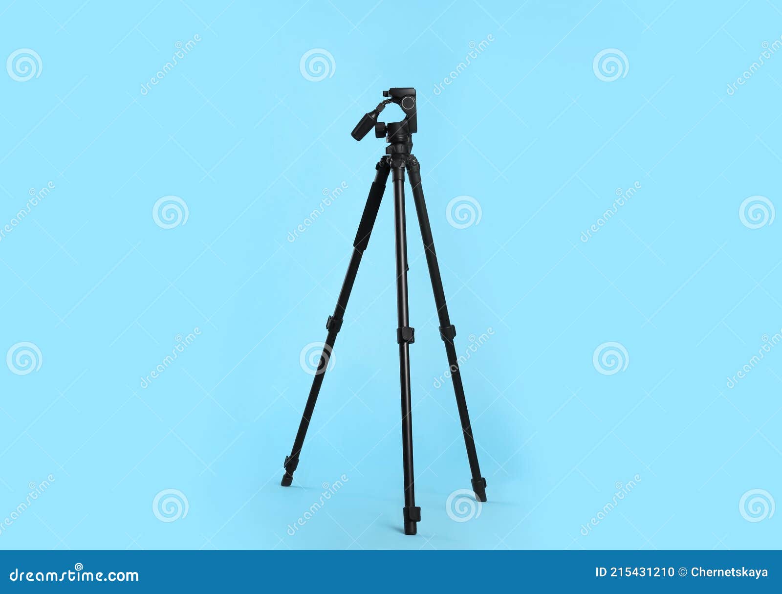 Modern Tripod for Camera on Light Blue Background Stock Photo - Image ...