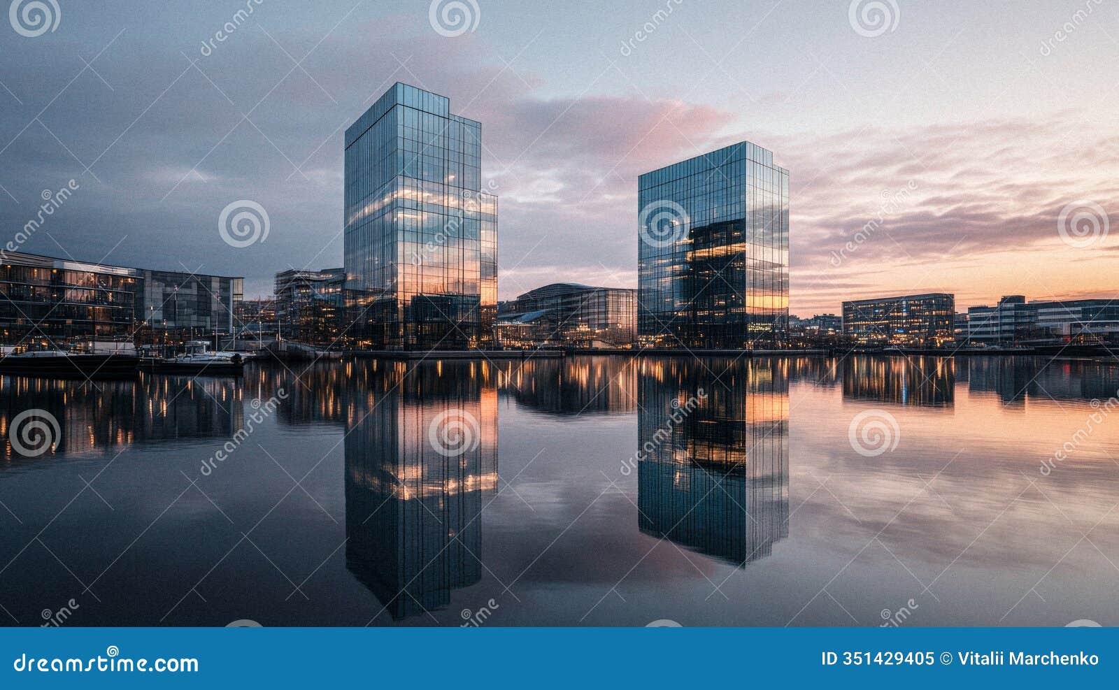 Modern Twin Towers Reflecting on Tranquil Waterfront at Sunset Stock ...