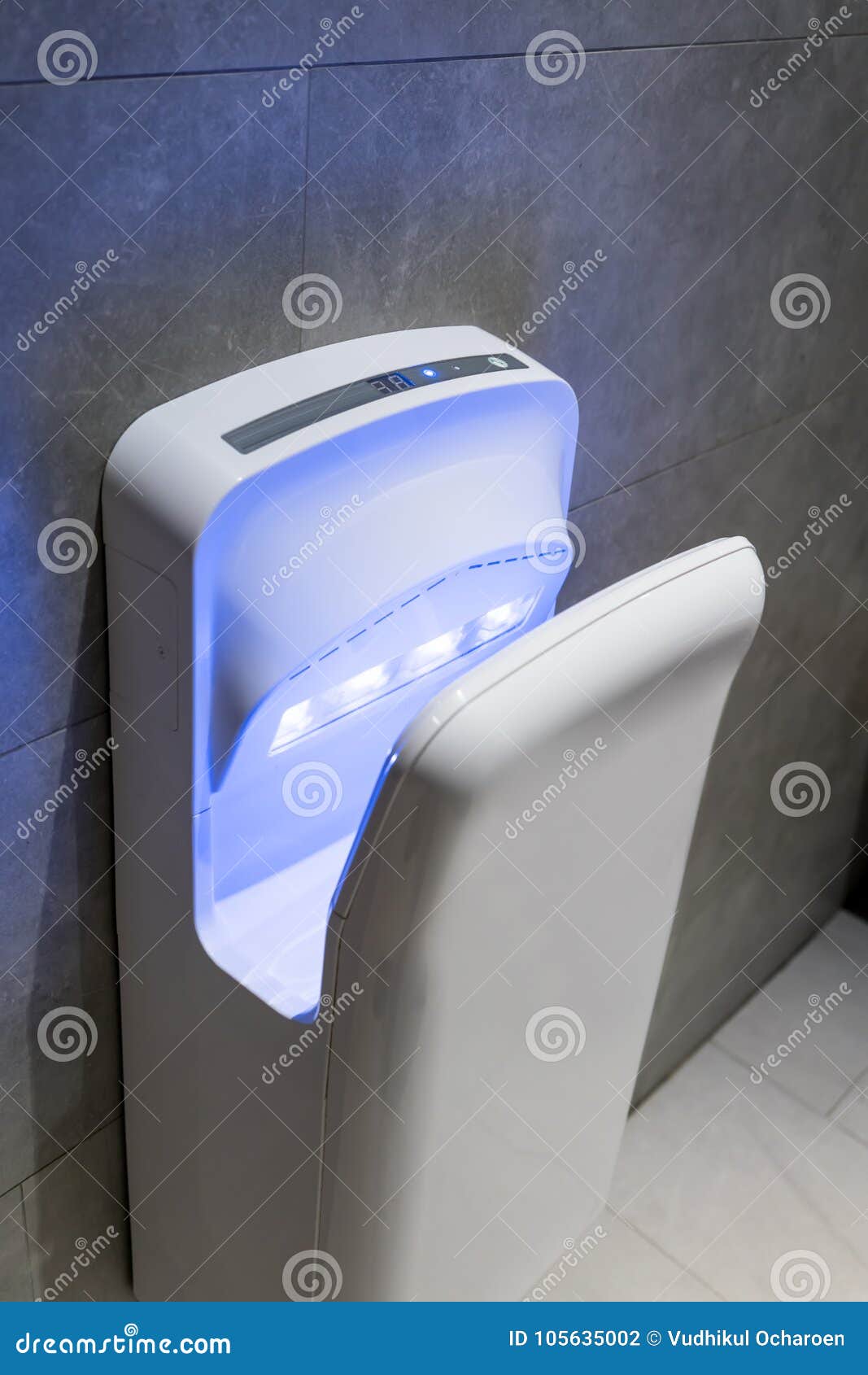 Modern Vertical Hand Dryer in Public Restroom Stock Photo - Image of ...