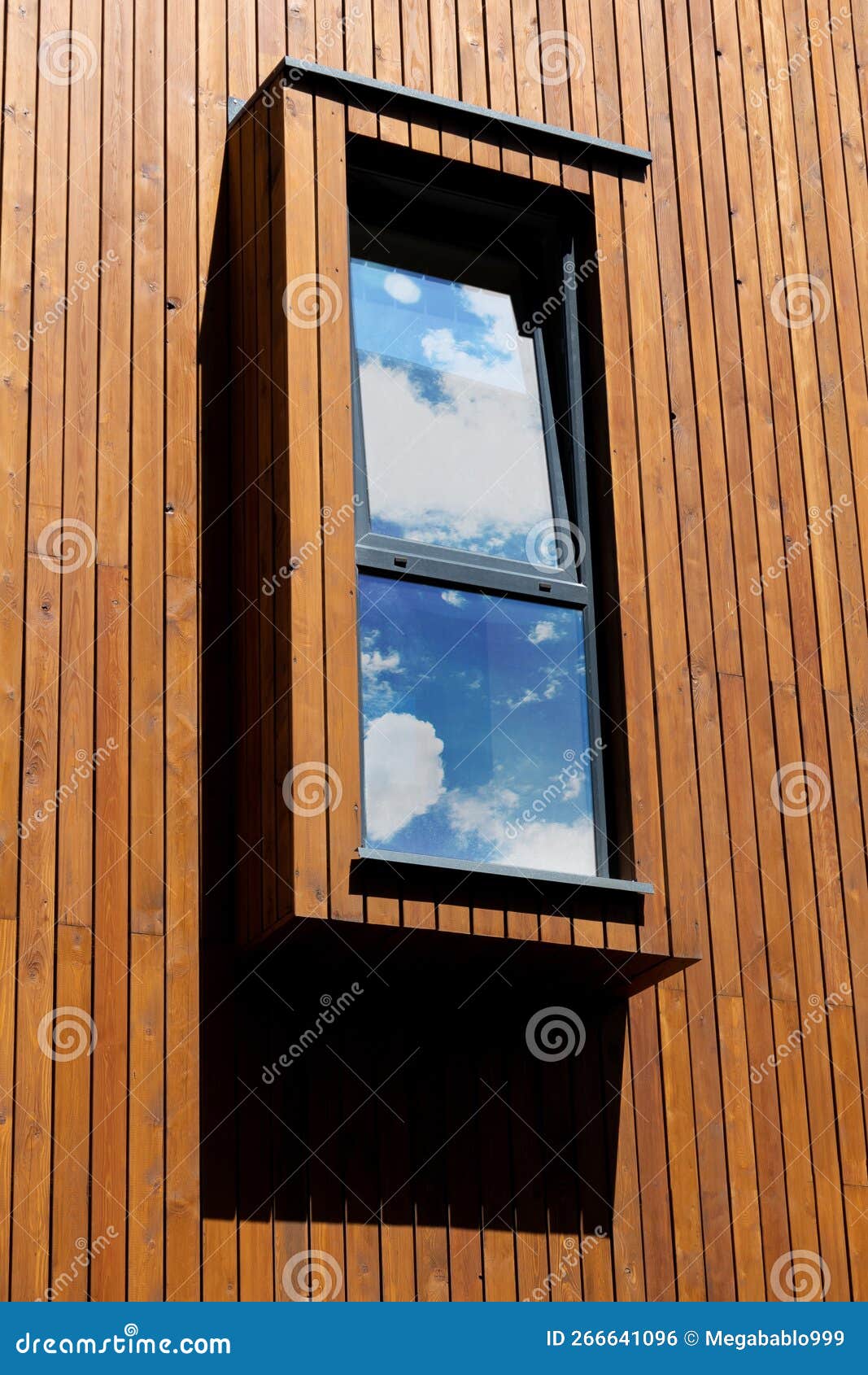 Modern Vertical Window on the Facade of the House with Wooden Plank ...