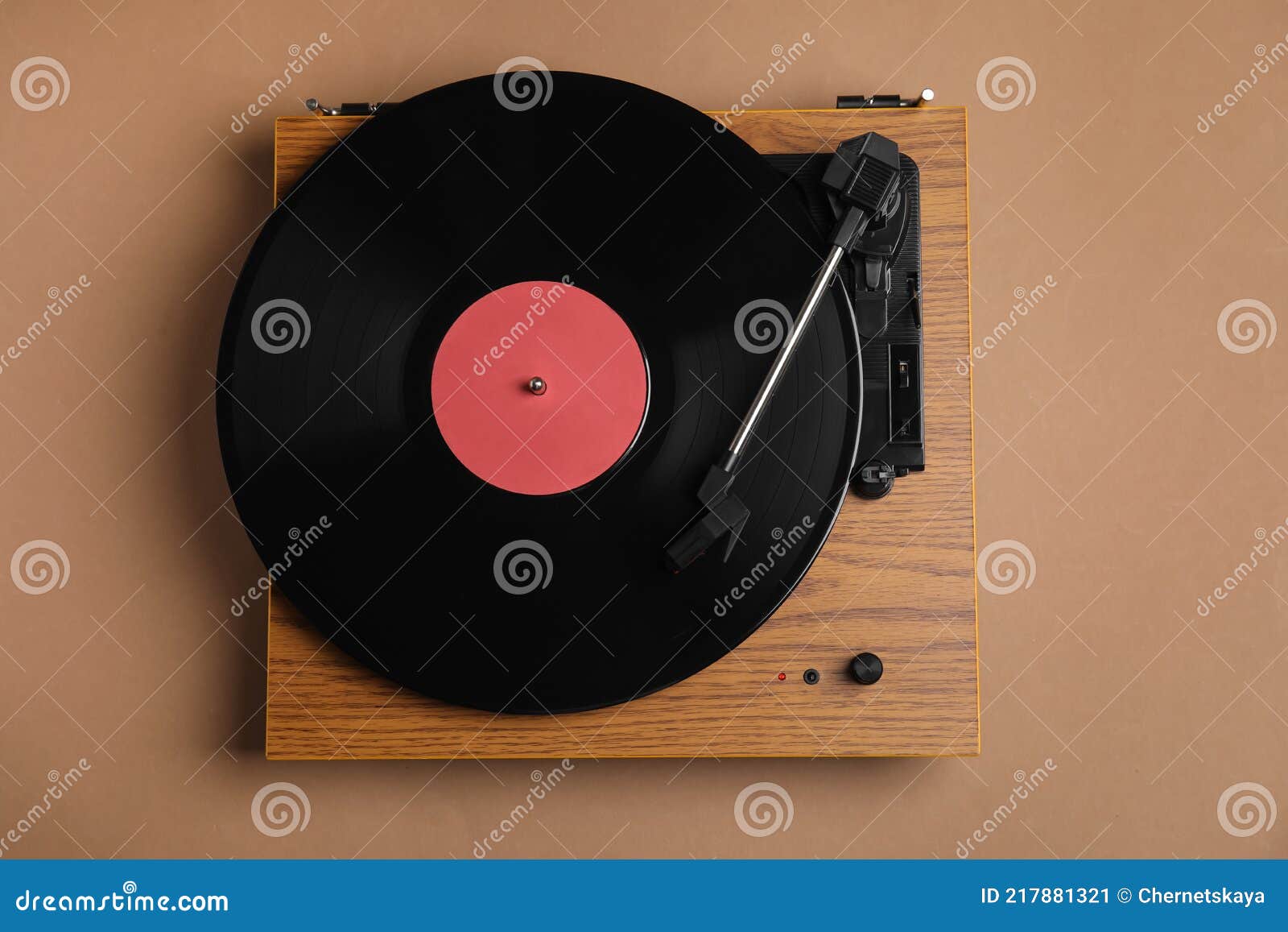 Modern Vinyl Record Player with Disc on Brown Background, Top View ...