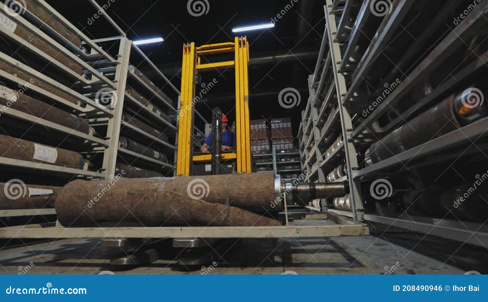 White Man Worker Pushing Stacker with Cylindrical Shaft in Warehouse ...