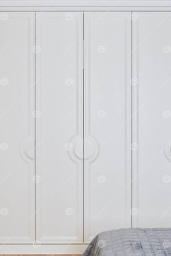 Contemporary Modern White Wardrobe Featuring Stylish Circular Handles ...