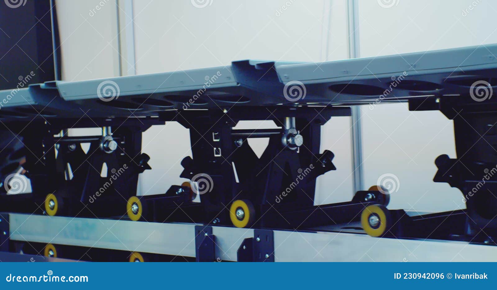 Modern Warehouse Equipment.a Train from Roller Conveyor Carts Moves on ...