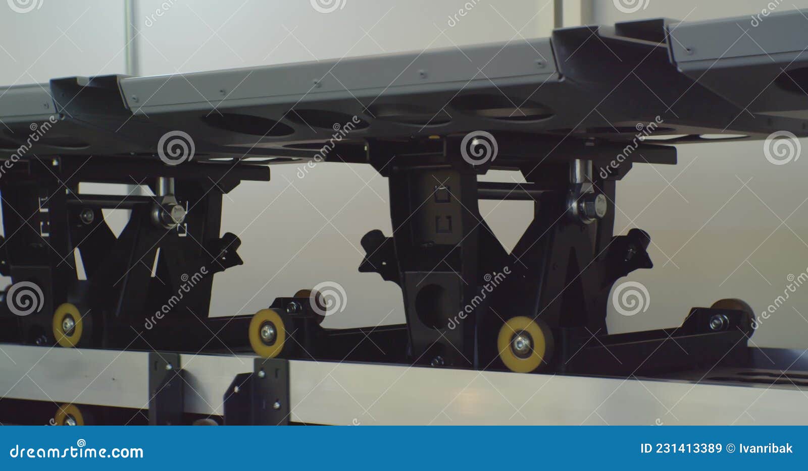 Modern Warehouse Equipment.a Train from Roller Conveyor Carts Moves on ...