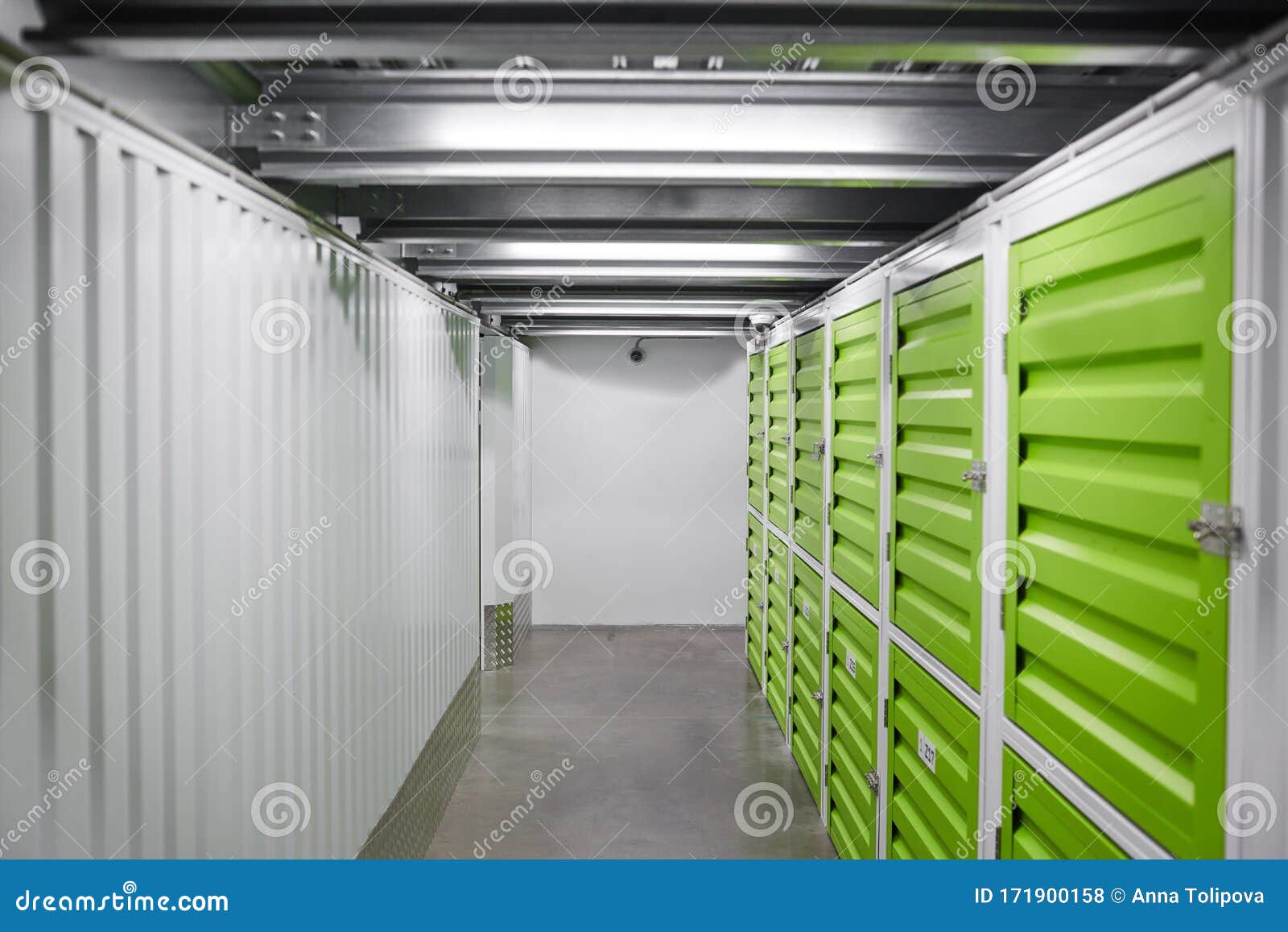 Modern Warehouse with Green Storage Rooms Stock Photo - Image of ...