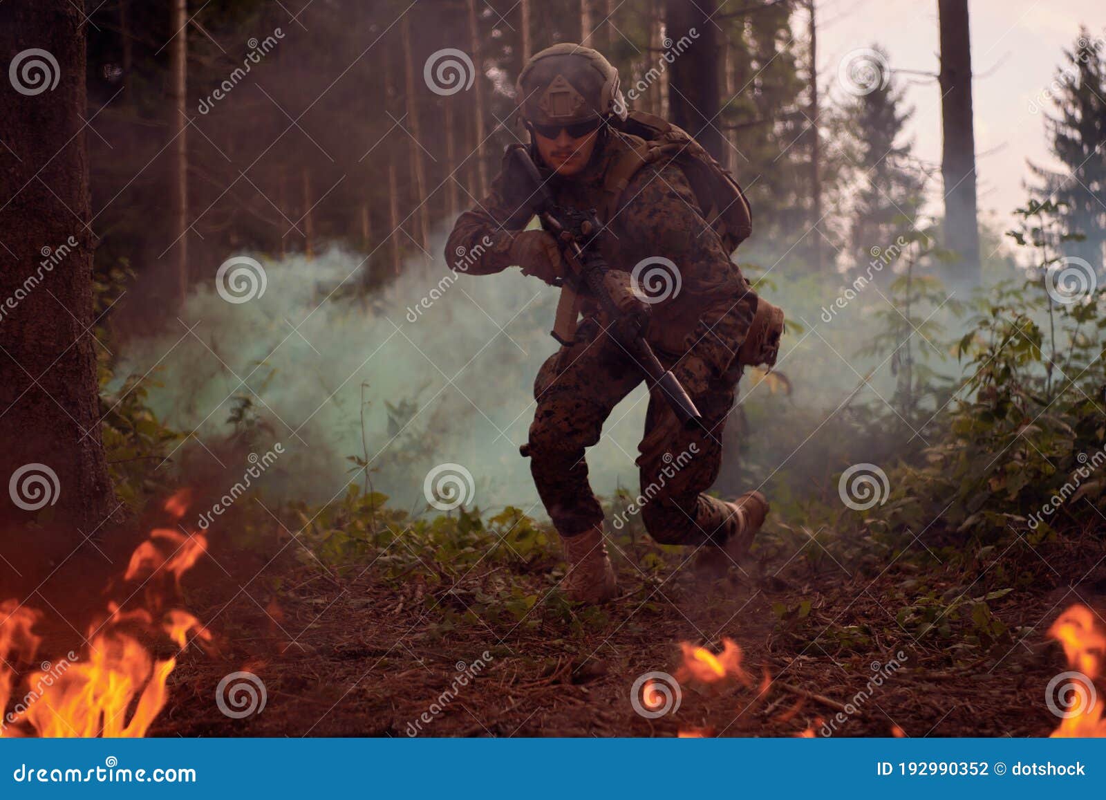 Soldier in action stock photo. Image of beam, helmet - 192990352