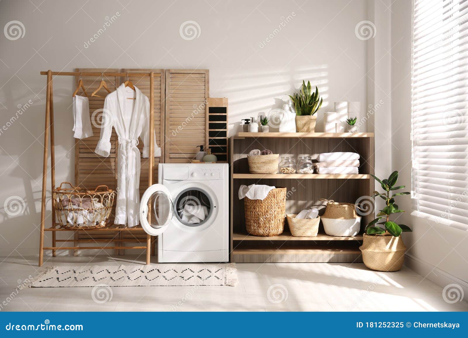 Modern Washing Machine and Shelving Unit in Laundry Room Stock Image ...