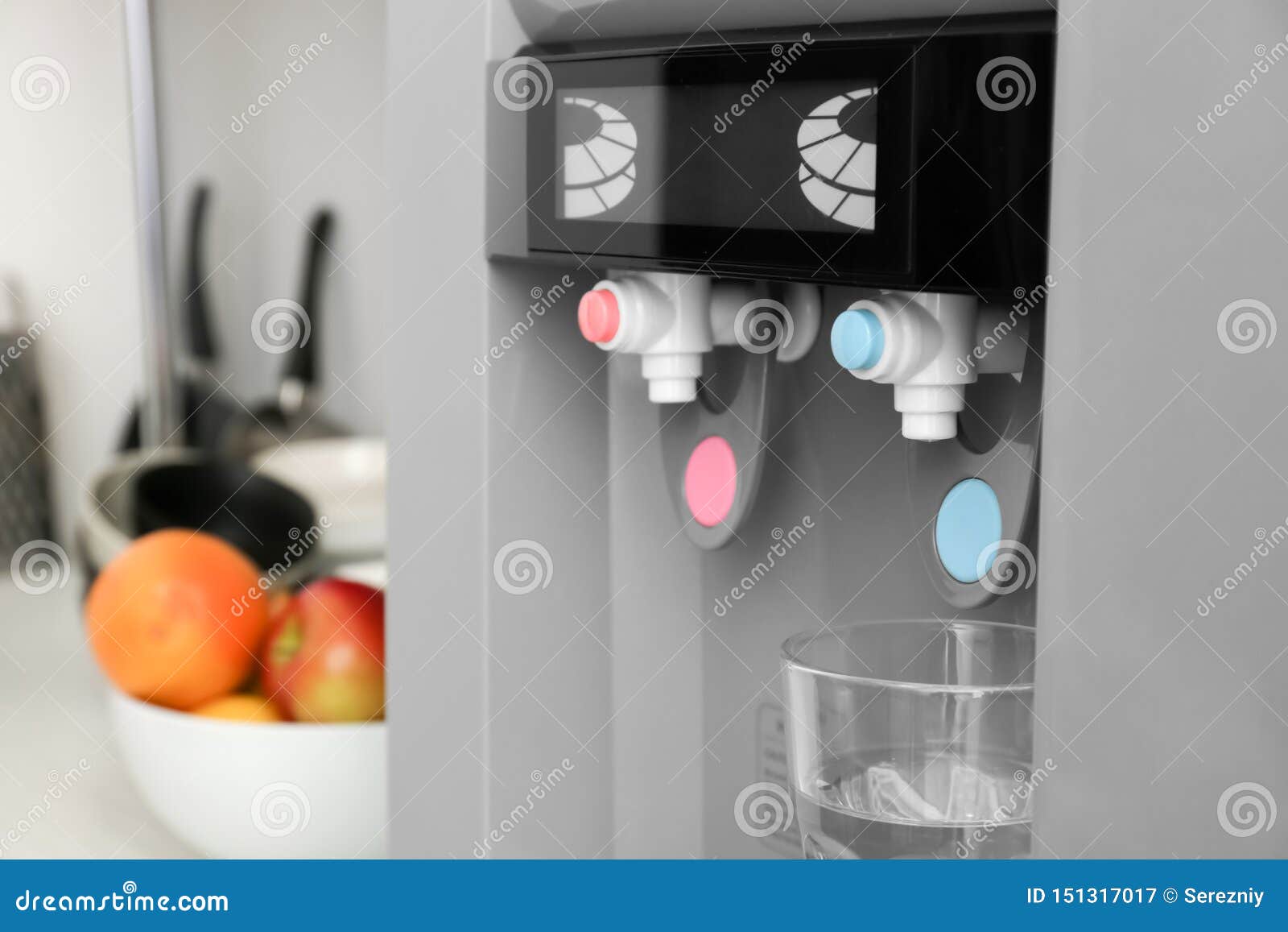 Modern Water Cooler with Glass on Kitchen Table, Closeup Stock Image ...