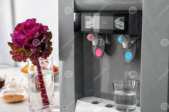 Modern Water Cooler on Table in Kitchen Stock Image - Image of beverage ...