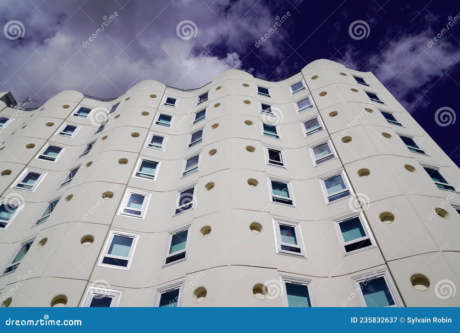 Modern White Building with Windows Facade in Geometric New Architecture ...