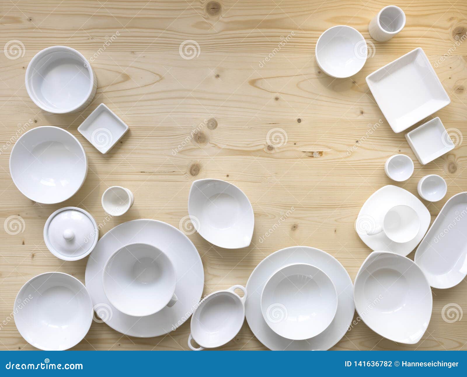 Modern, White Crockery, in Different Designs, Stands on a Light Wooden ...