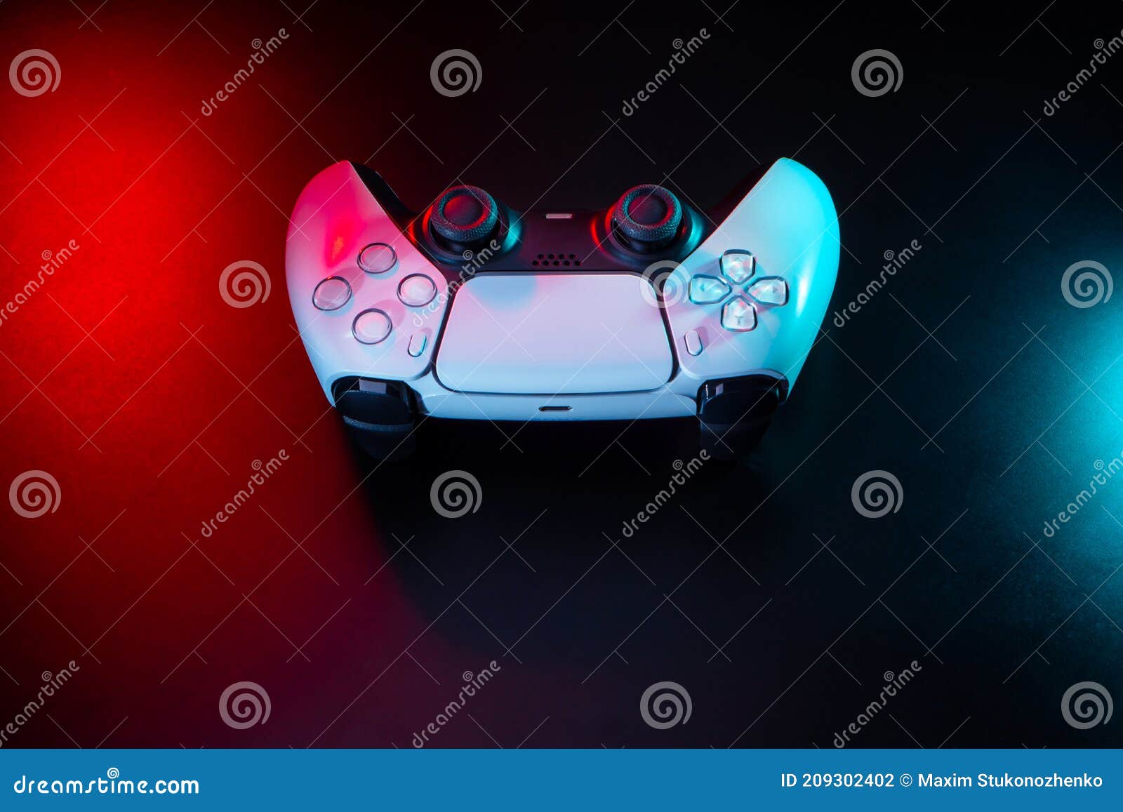 Modern White Gamepad Illuminated in Red and Blue. Game Controller for ...