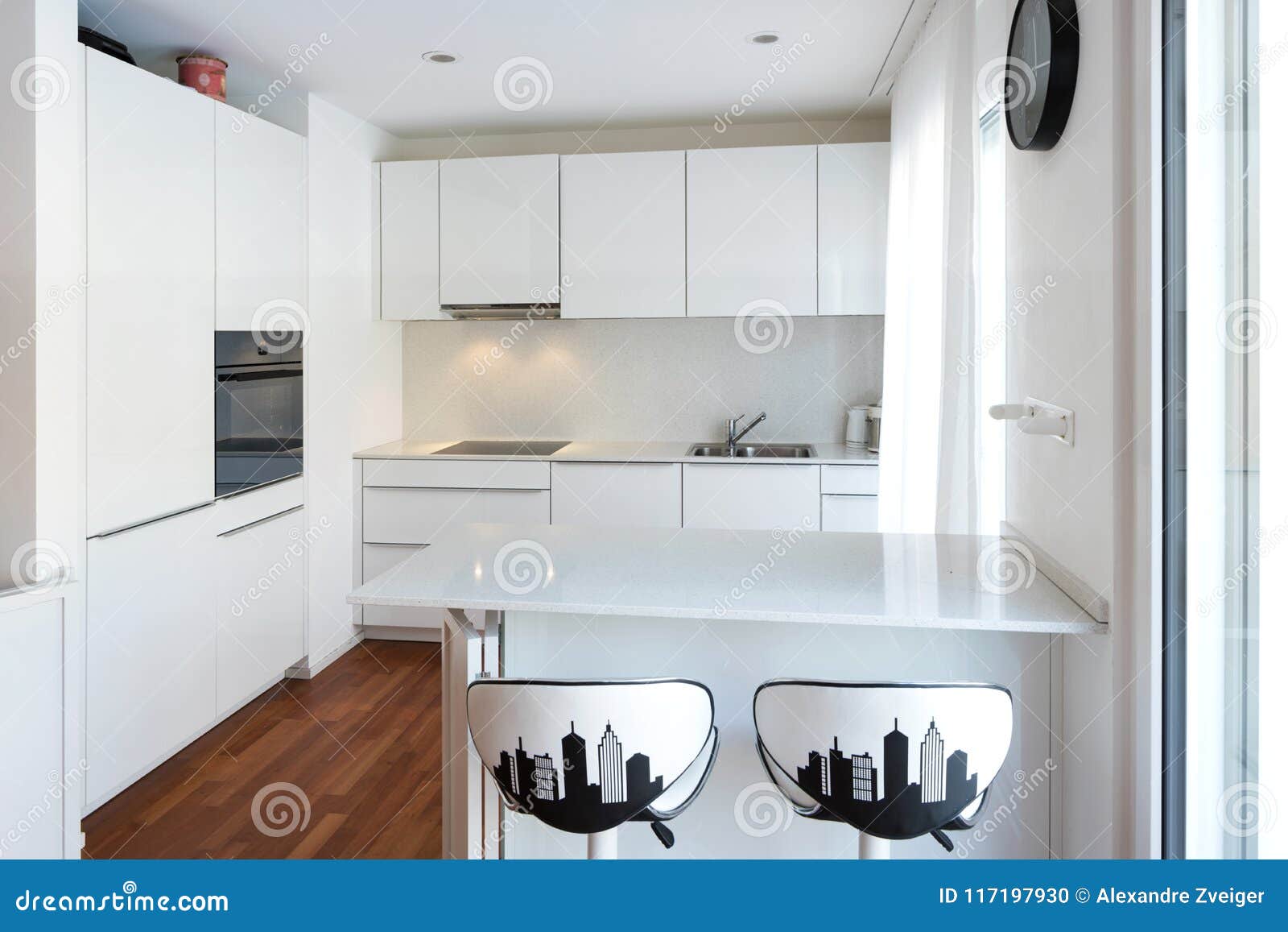 Modern White Kitchen with Peninsula Stock Photo - Image of furniture ...
