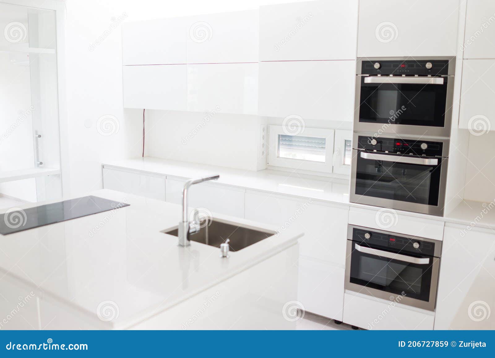 Modern White Kitchen ,Spacious Luxurious with Bar Design Stock Image ...