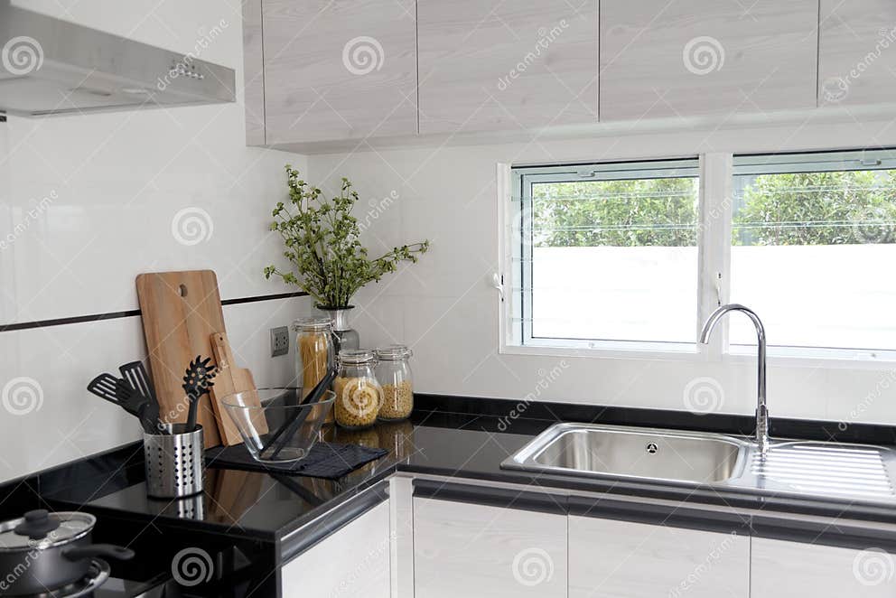 Modern white kitchen unit stock image. Image of light - 121784787