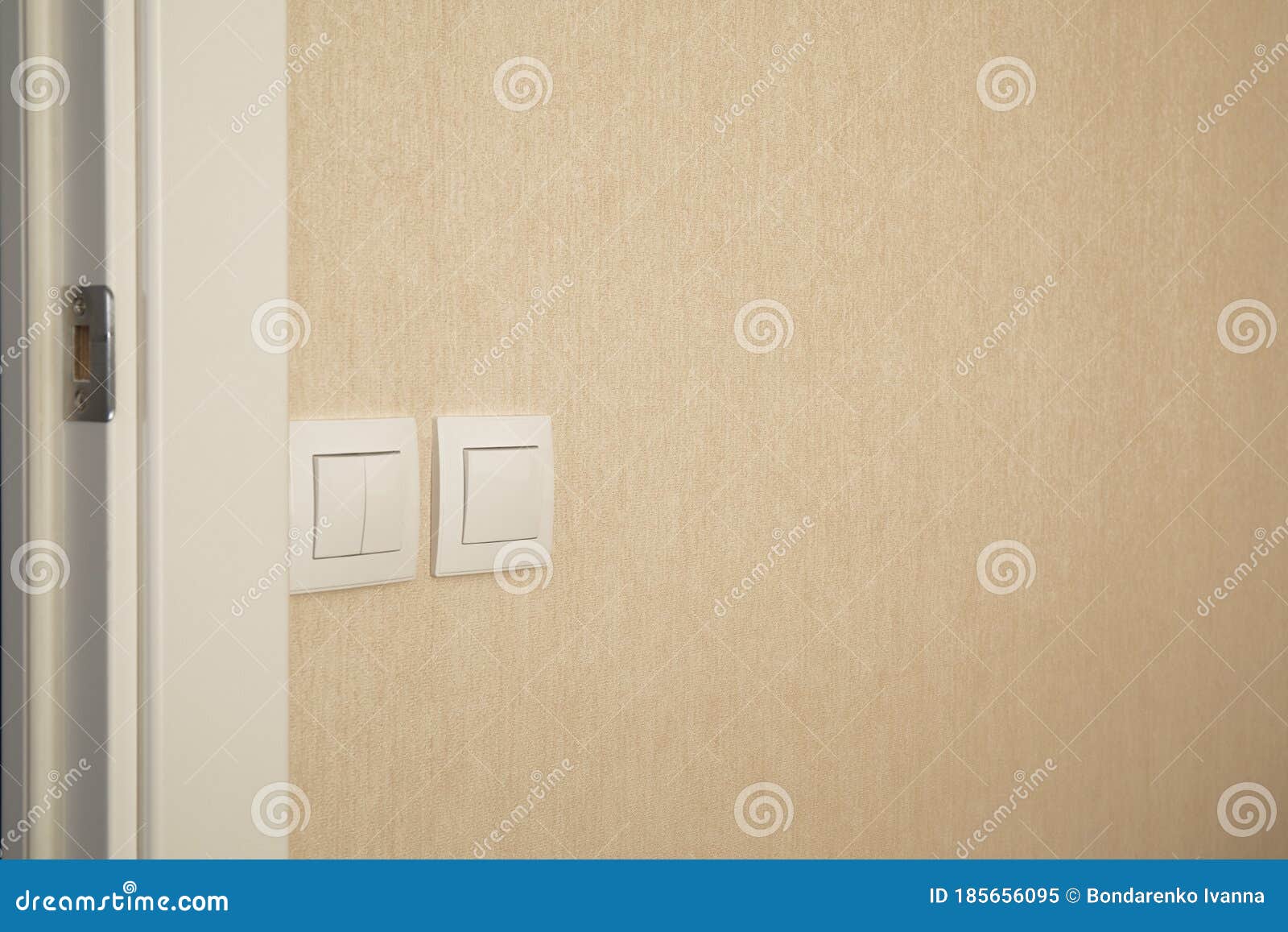 Modern White Light Switches on Light Wall with White Door Stock Image ...