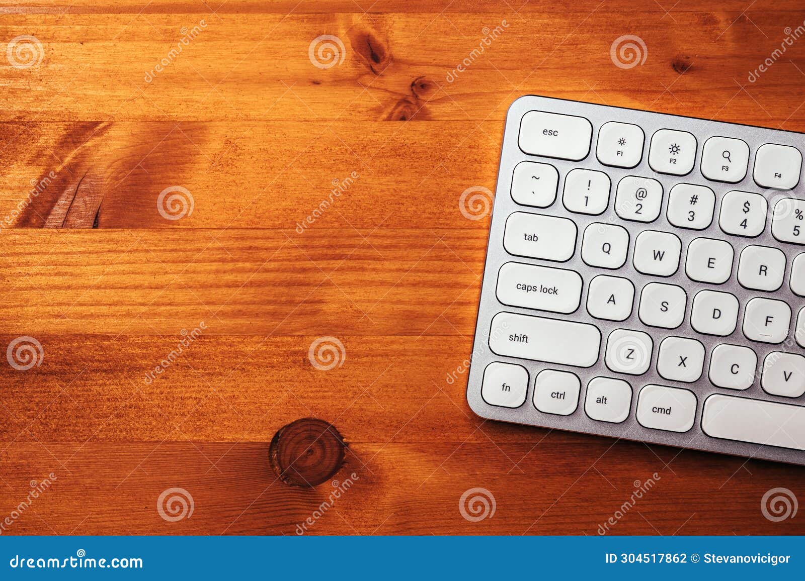 Modern White Metallic Personal Computer Keyboard on Brown Office Desk ...